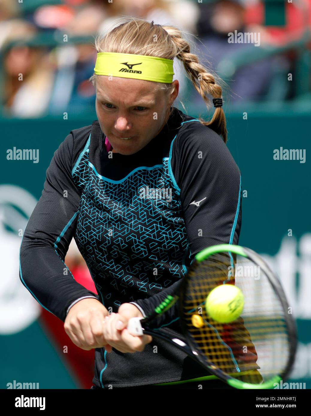 Kiki Bertens, from the Netherlands, returns a shot to Madison Keys ...