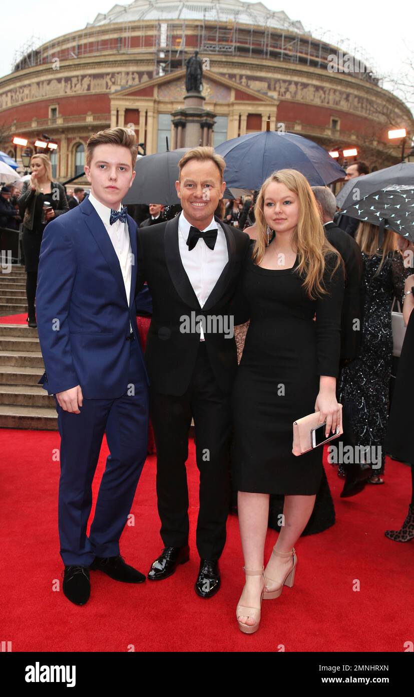 Actor Jason Donovan, centre, poses with children Jemma Donovan, right ...