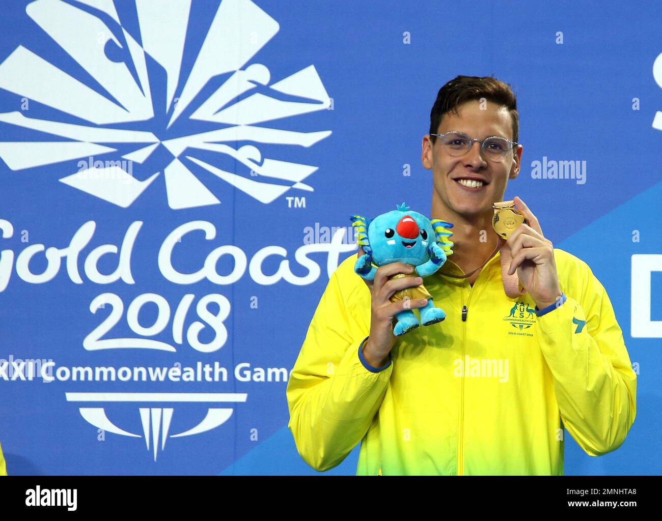 Men's 50m backstroke gold medalist Australia's Mitch Larkin stands on ...