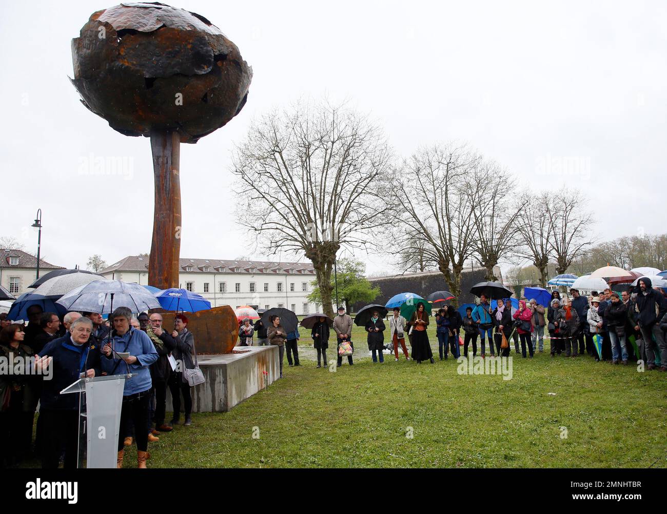 Irish Reverend Harold Good, left, delivers a speech during the ...