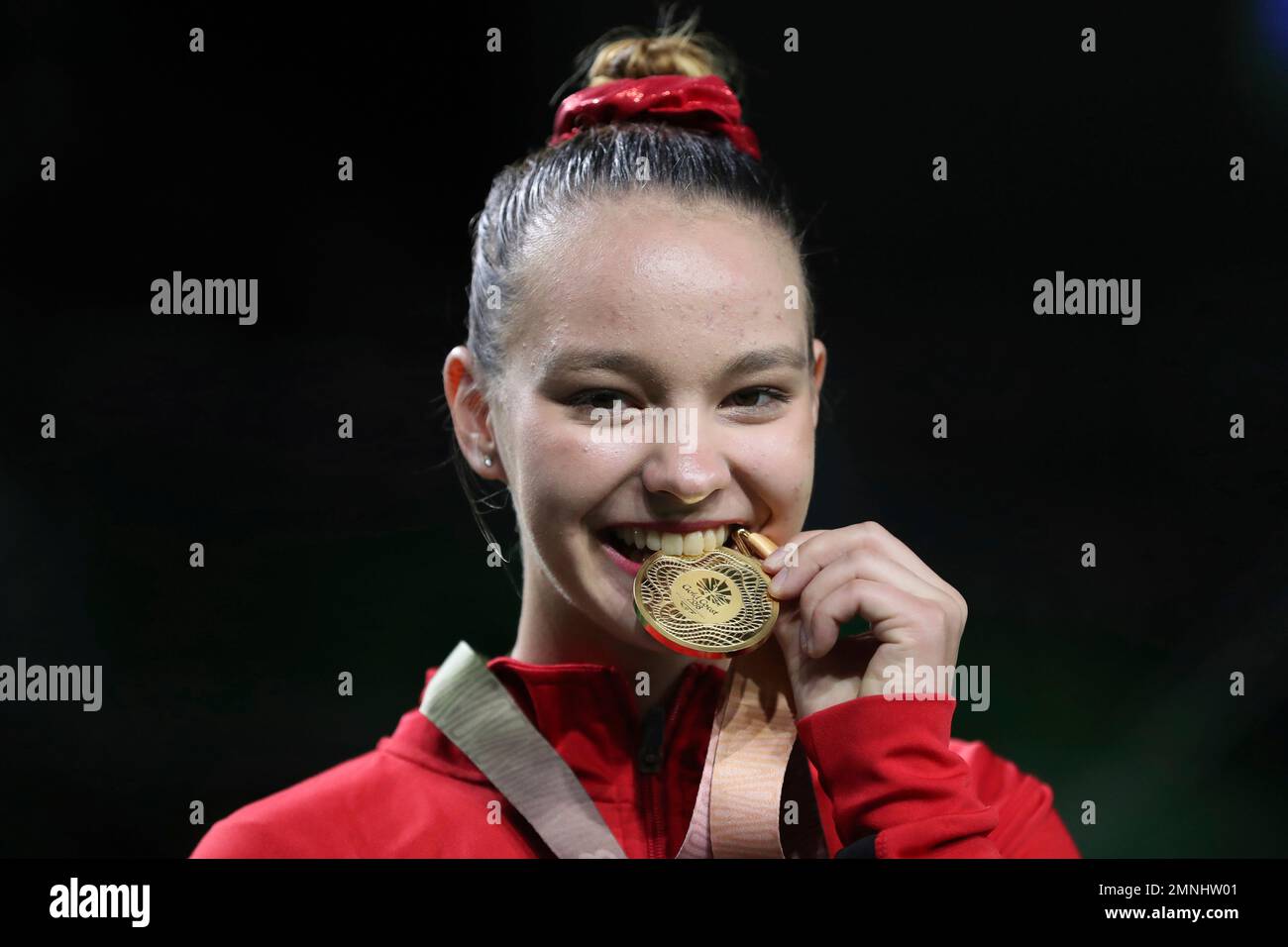 Gold medalist Shallon Olsen of Canada smiles from the podium after ...