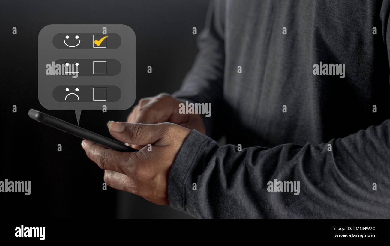 Businessman pressing smiley face emoticon on virtual touch screen. User ...