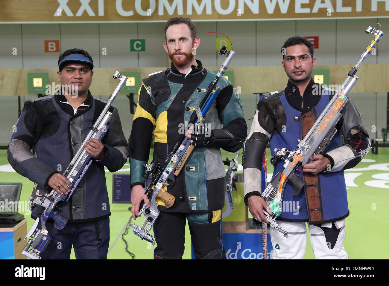 Winner Dane Sampson of Australia, center, poses with Abdullah Hel Baki ...
