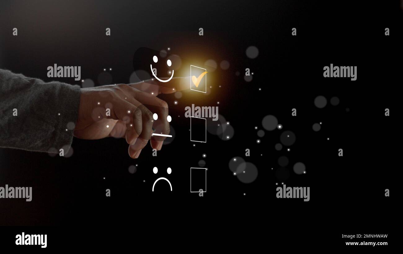 Businessman pressing smiley face emoticon on virtual touch screen. User ...