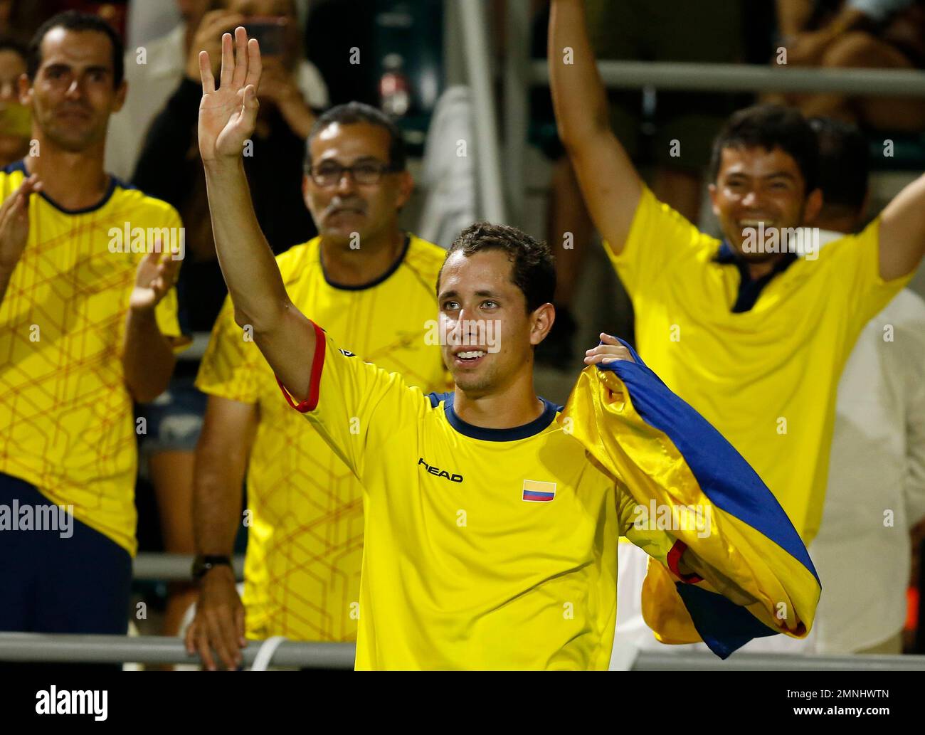 Daniel Elahi Galan, of Colombia, celebrates after defeating Thiago ...