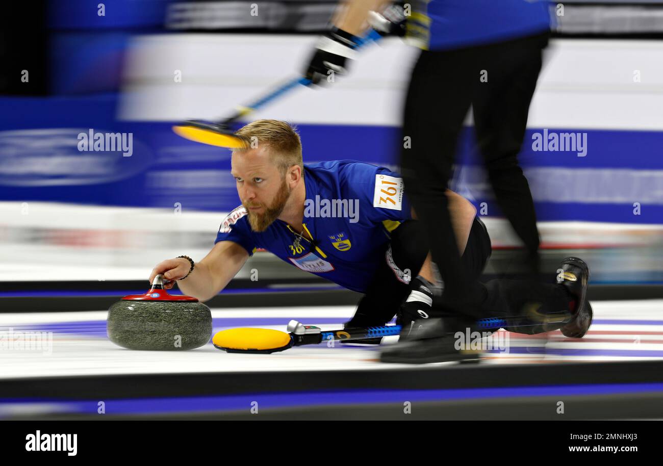 In this image taken with a slow shutter speed, Sweden skip Niklas Edin ...