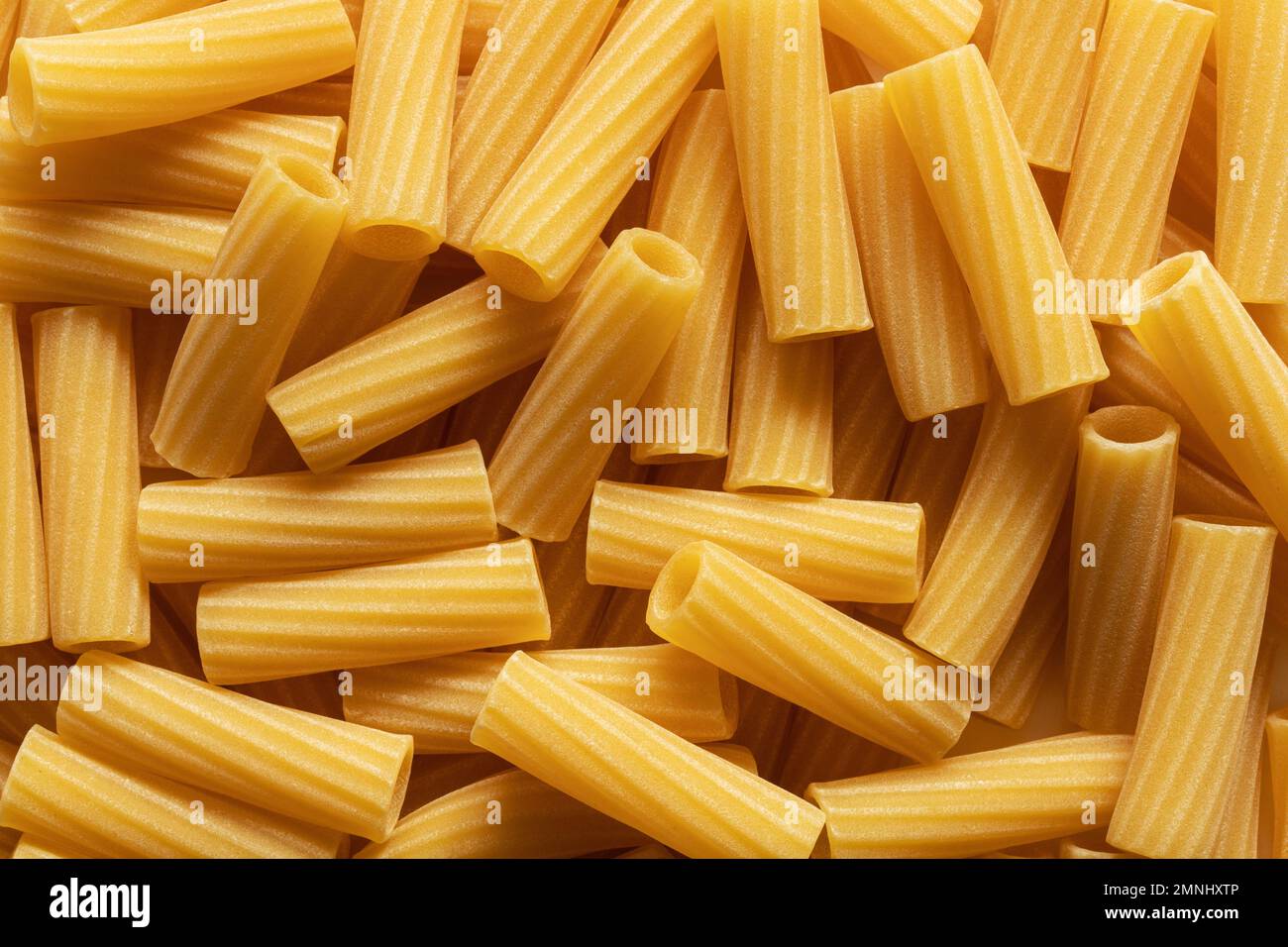 Uncooked dry pasta. Food background. Top view of noodles Stock Photo ...