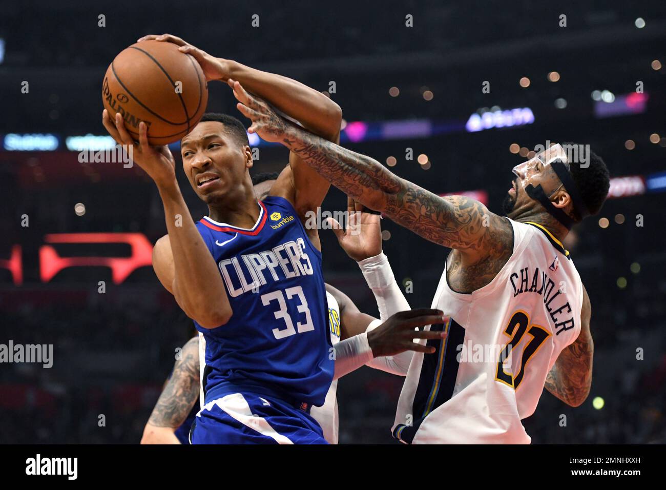 Los Angeles Clippers forward Wesley Johnson (33) grabs a rebound from ...