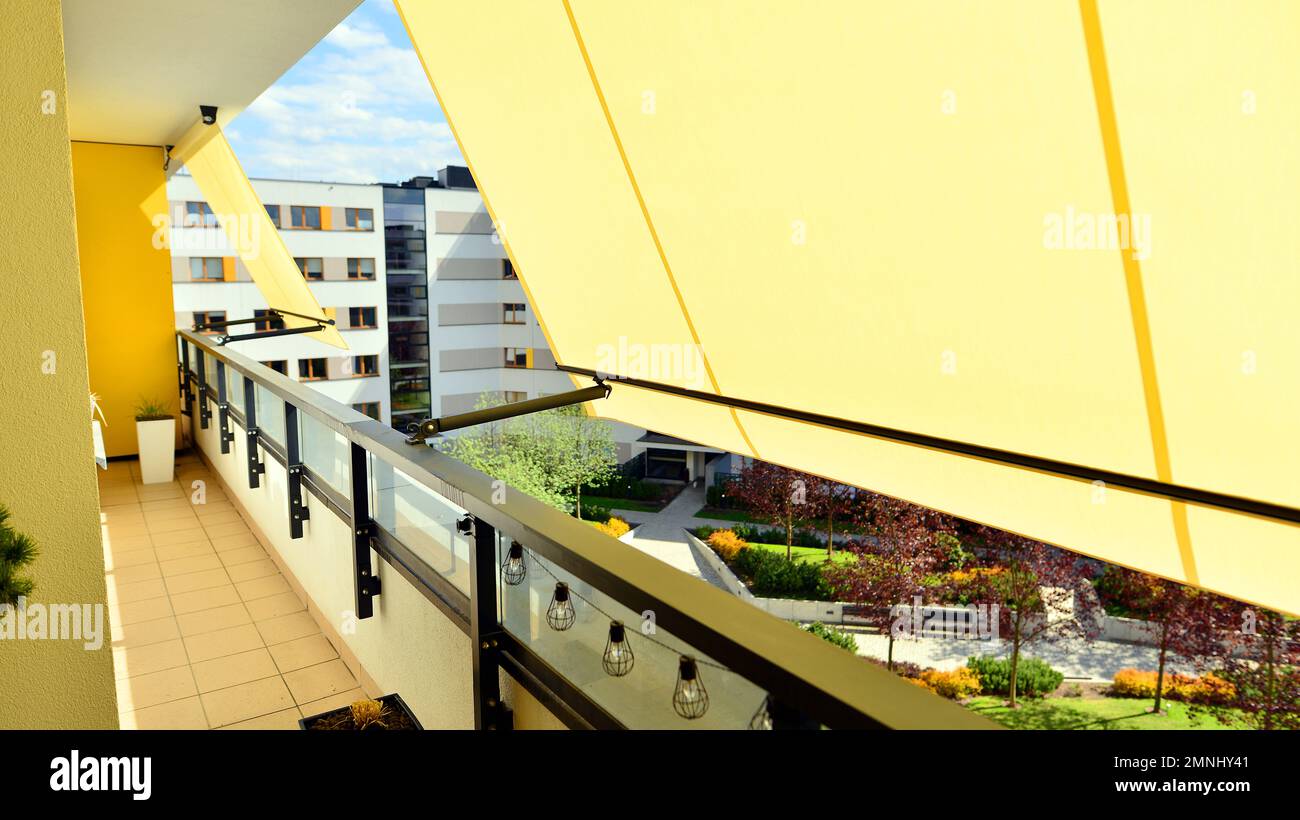 Modern architecture building facade with awnings. Balcony with awning ...