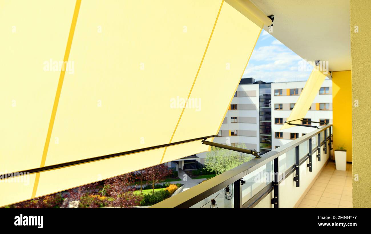 Modern architecture building facade with awnings. Balcony with awning ...