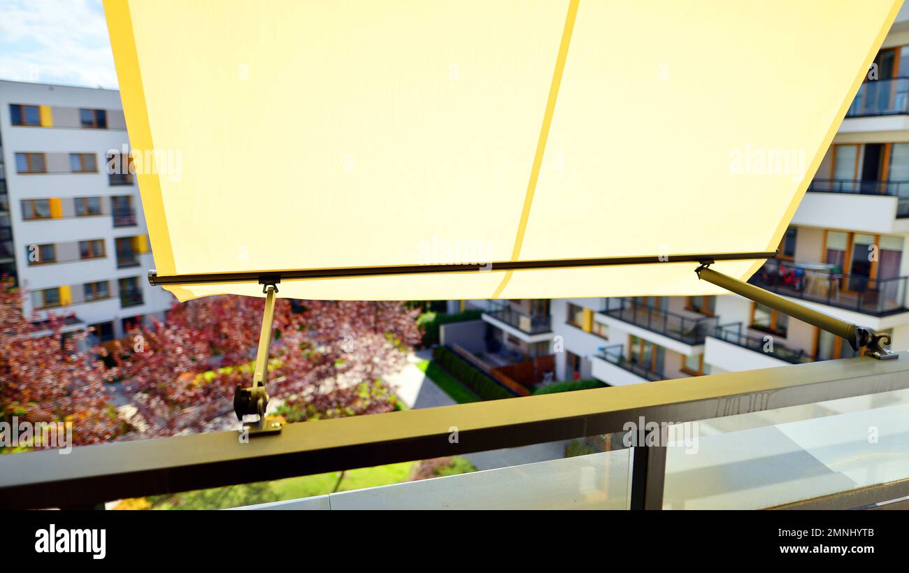Modern architecture building facade with awnings. Balcony with awning ...