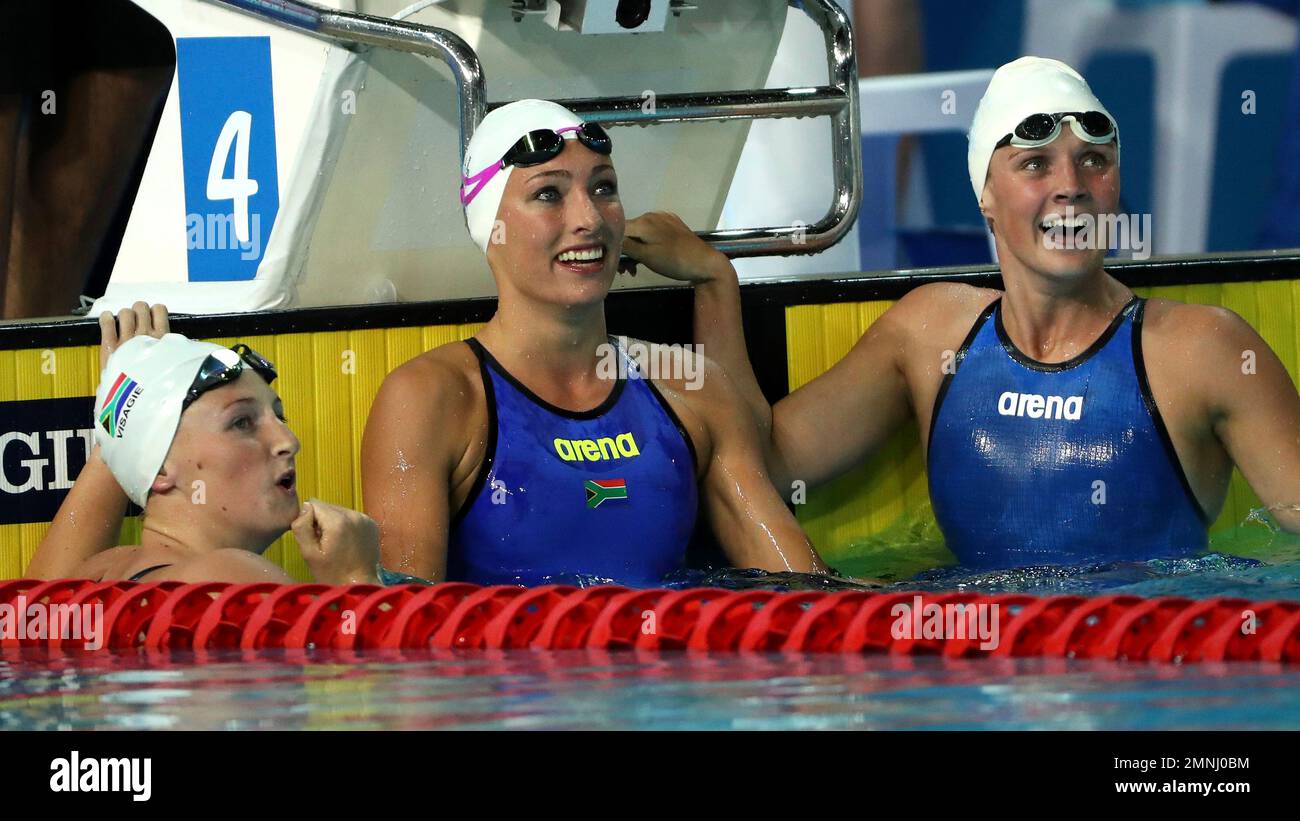 South Africa's Tatiana Schoenmaker , centre, reacts with compatriots ...