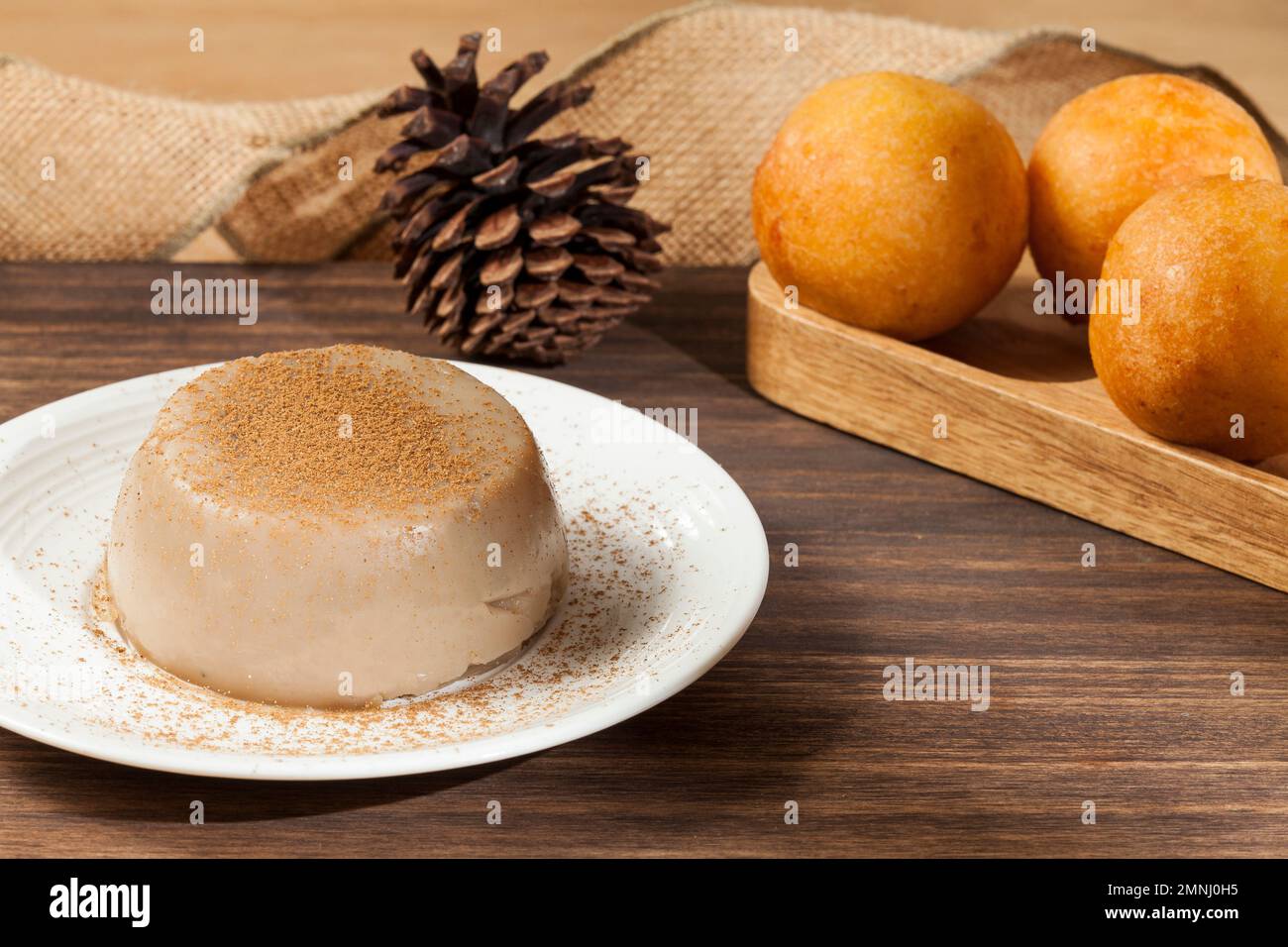 The traditional Colombian bunuelos (fried cheese bread) and natilla at ...
