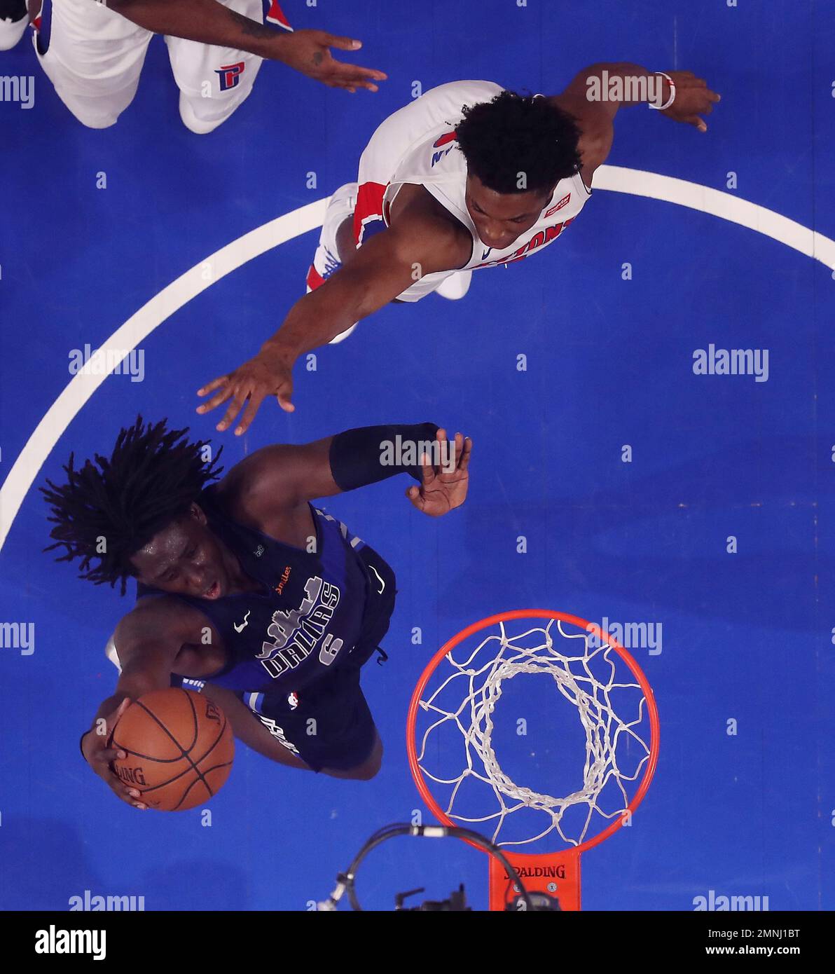 Dallas Mavericks forward Johnathan Motley (6) shoots as Detroit Pistons ...