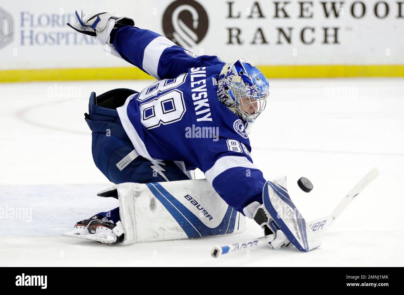 Tampa Bay Lightning goaltender Andrei Vasilevskiy (88) makes a blocker ...