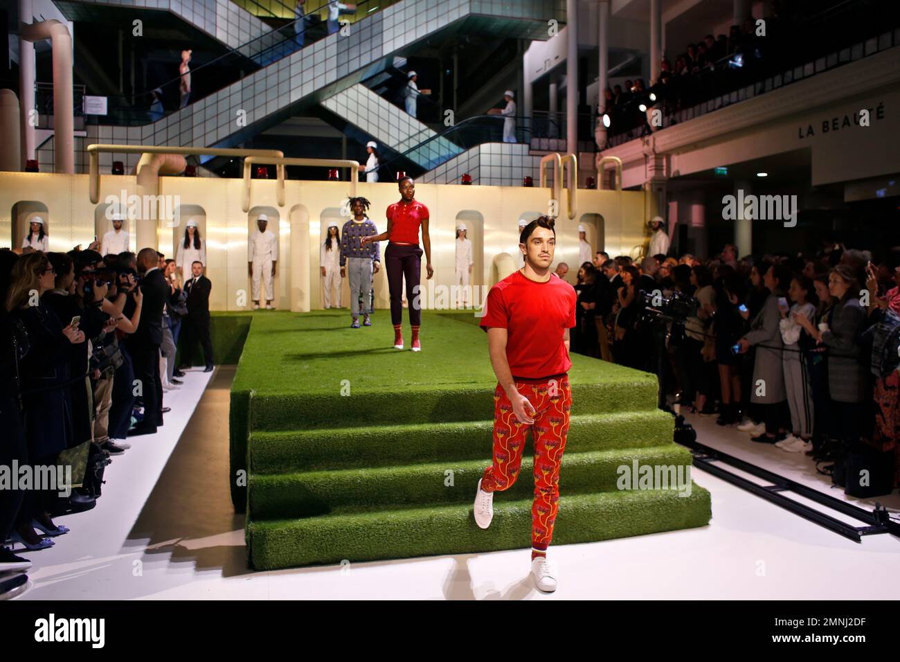 Models wear creations designed by Belgian singer Stromae and his wife ...