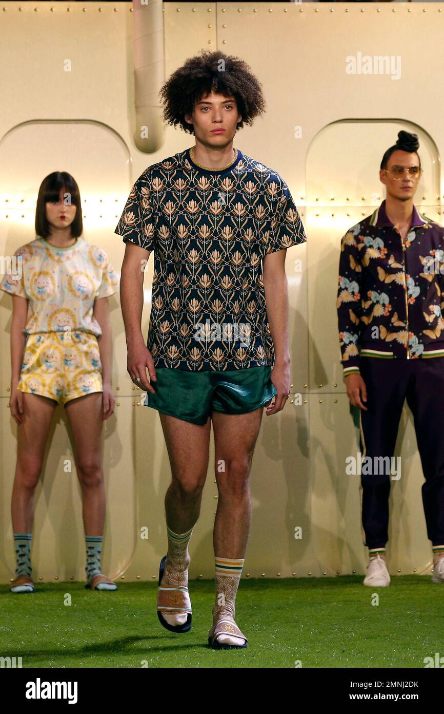Models wear creations designed by Belgian singer Stromae and his wife ...