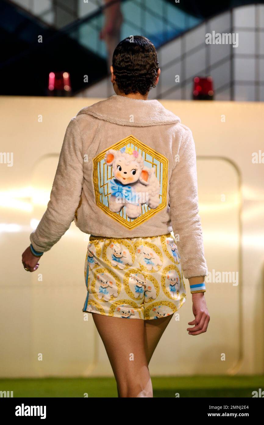 A model wears a creation designed by Belgian singer Stromae and his ...