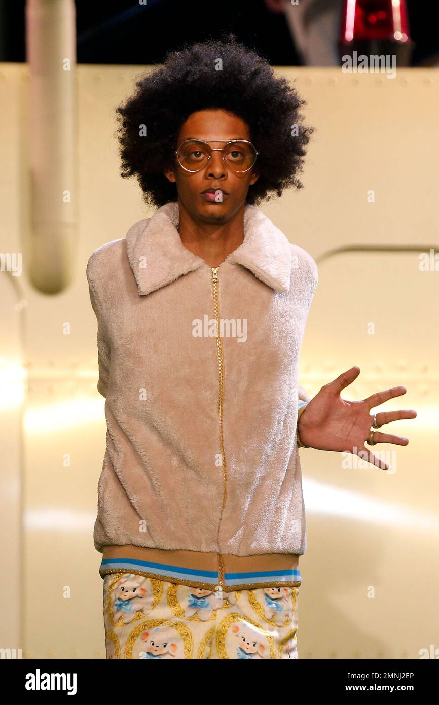 A model wears a creation designed by Belgian singer Stromae and his ...