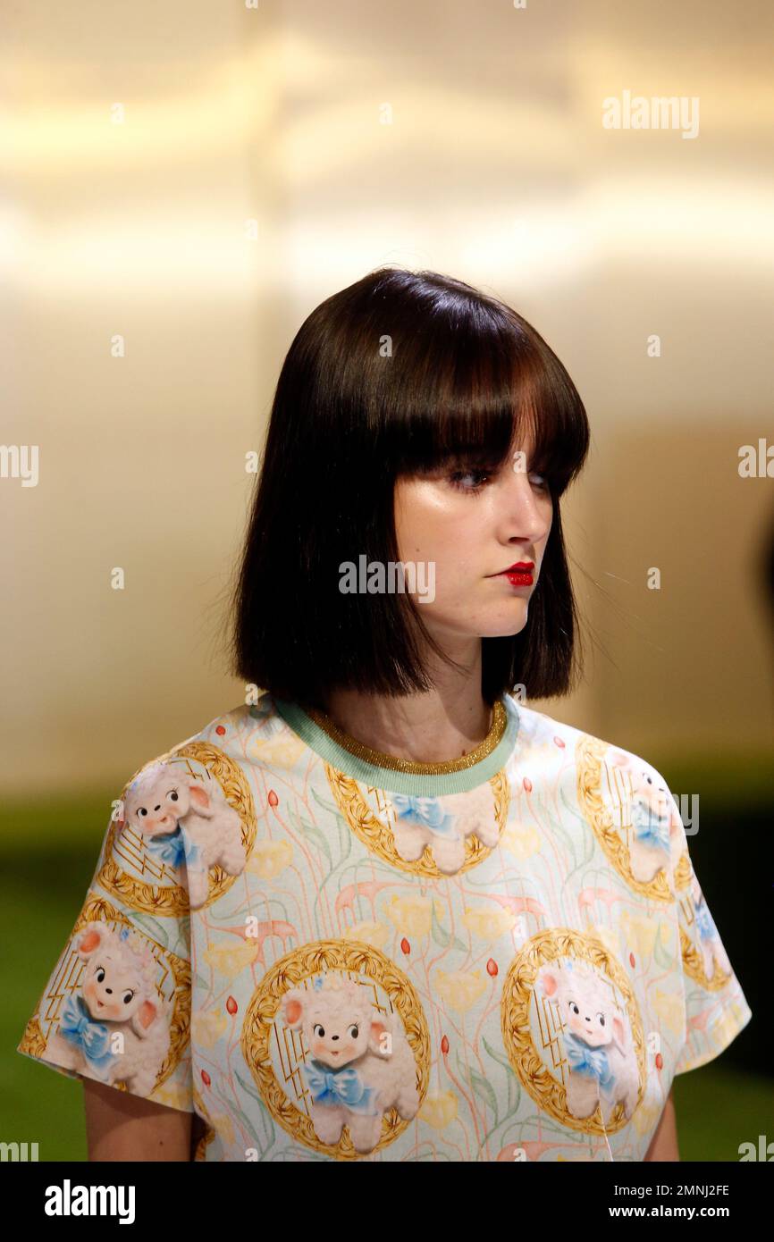 A model wears a creation designed by Belgian singer Stromae and his ...