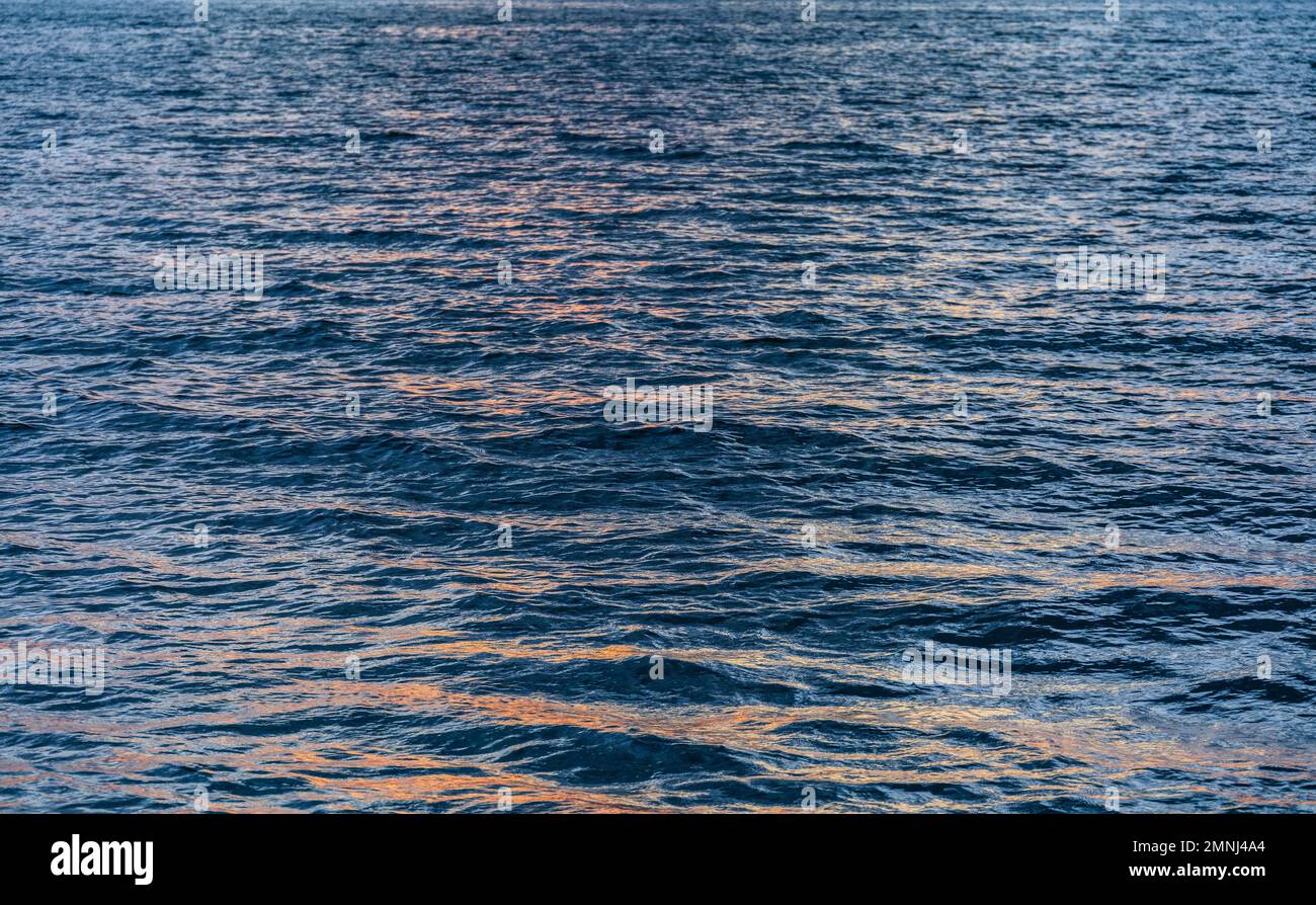 Sunset reflection in ocean surface hi-res stock photography and images - Alamy