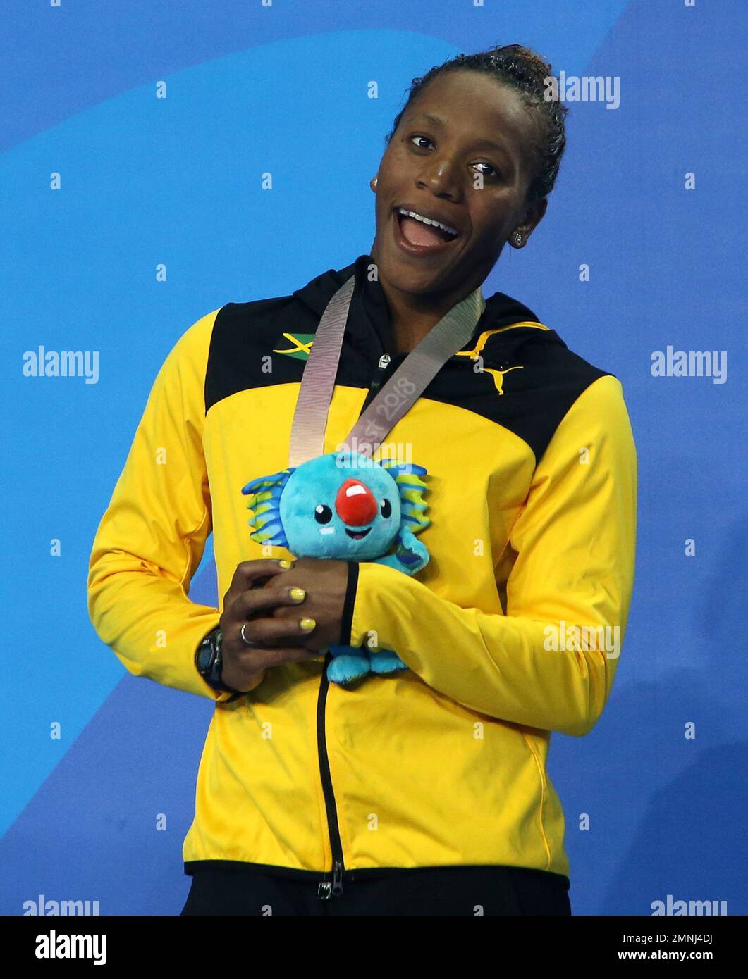 Jamaica's Alia Atkinson reacts on the podium after winning a silver ...