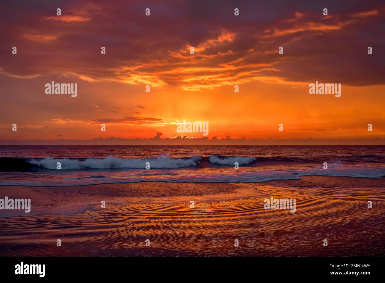 Dramatic sunset sky above ocean Stock Photo - Alamy