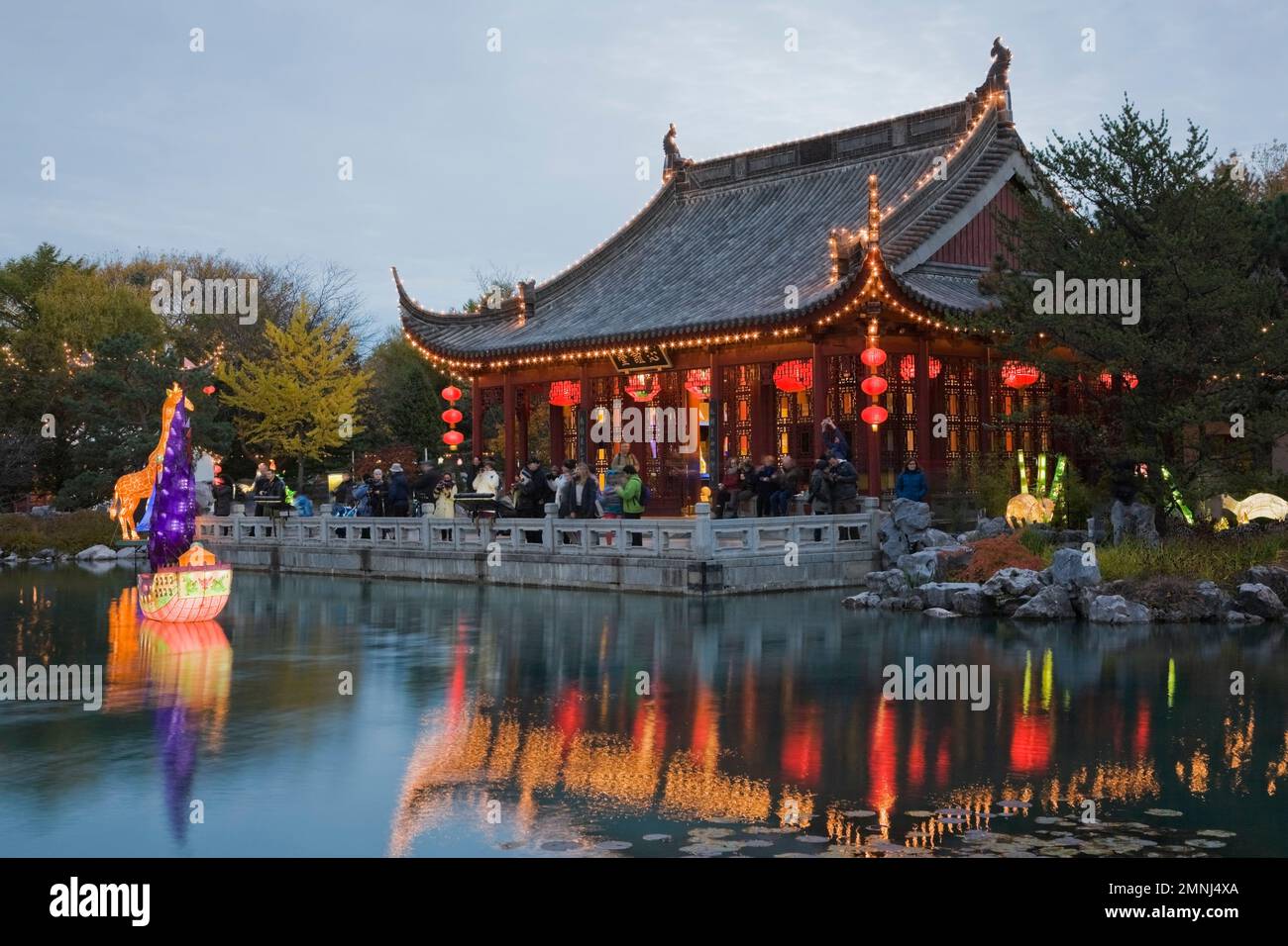 Friendship Hall pavilion and Illuminated Chinese Junk and giraffe ... Friendship Hall pavilion and Illuminated Chinese Junk and giraffe ...