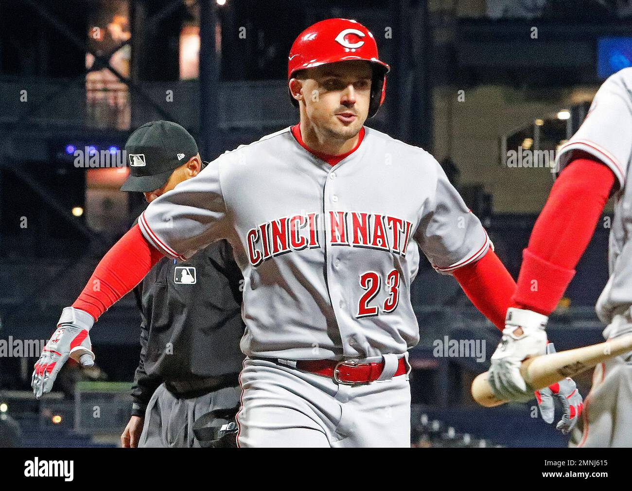 Cincinnati Reds' Adam Duvall crosses the plate after hitting a solo ...