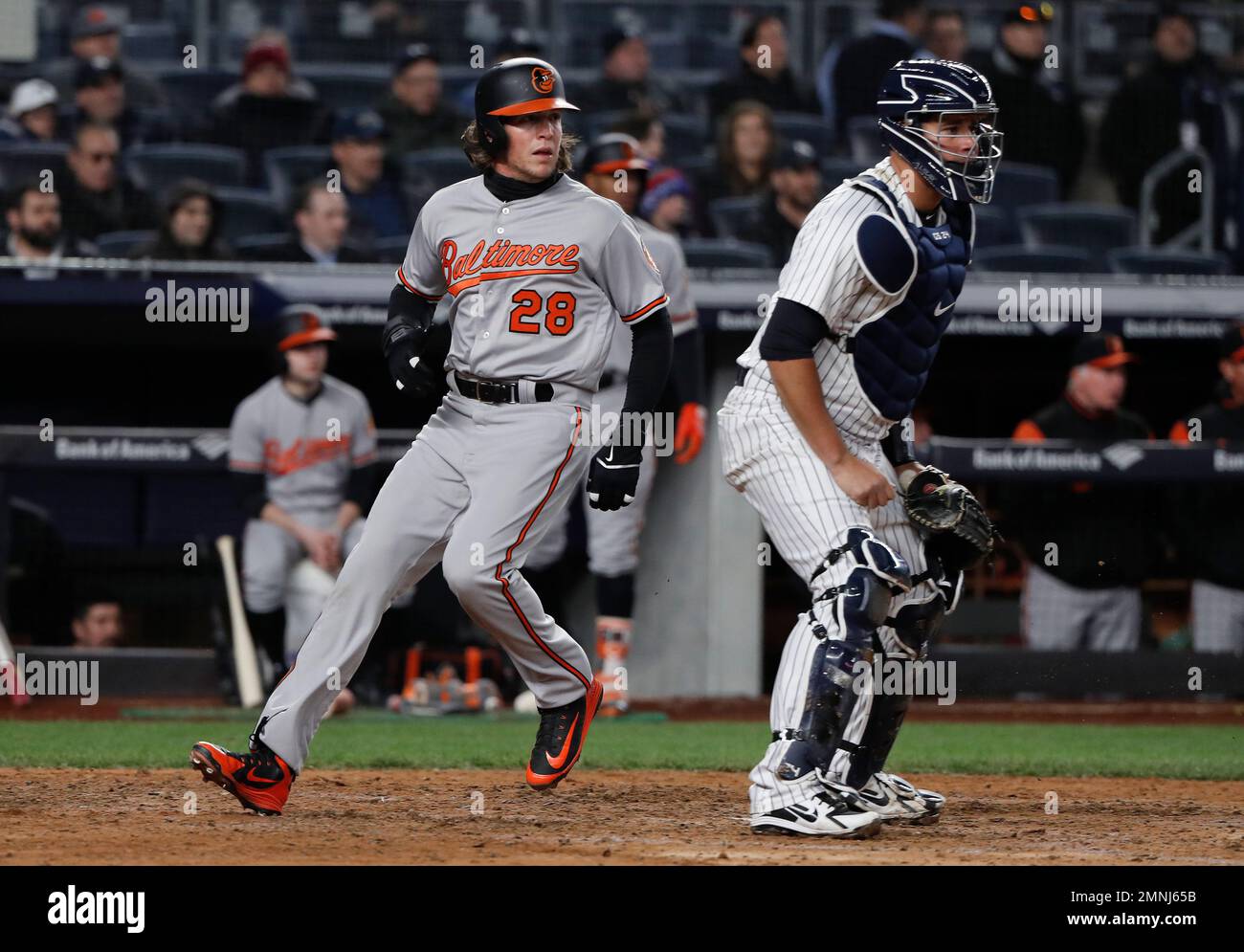 Baltimore Orioles' Colby Rasmus (28) scores a run as New York Yankees ...