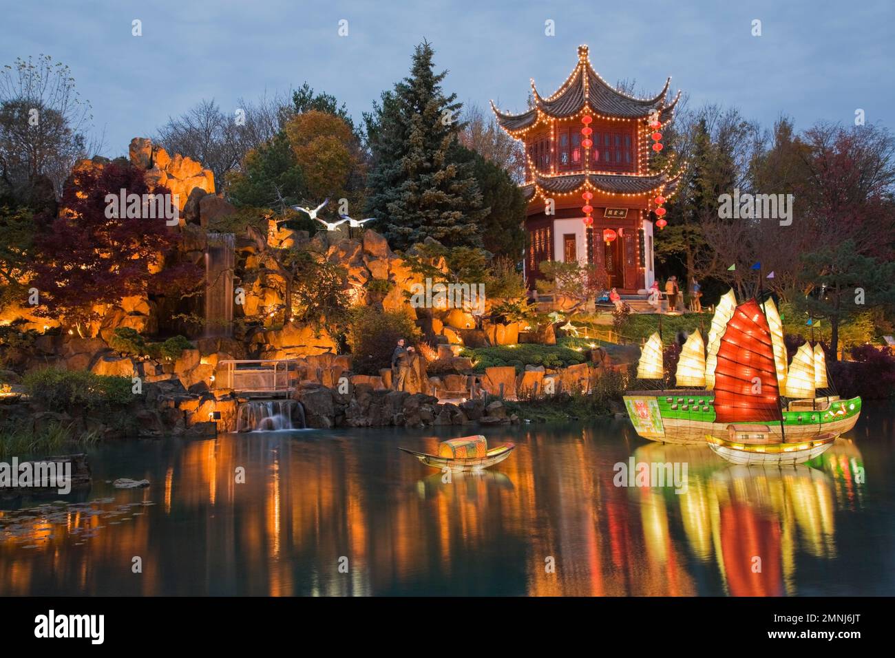 Illuminated Chinese Junks lanterns on Dream Lake with Stone Mountain ... Illuminated Chinese Junks lanterns on Dream Lake with Stone Mountain ...