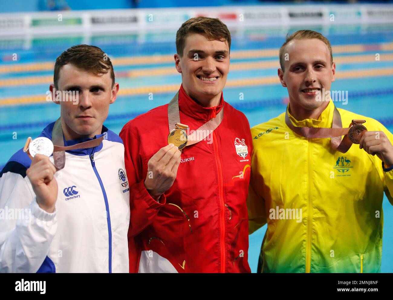 Men's 200m breaststroke gold medalist England's James Wilby, centre ...