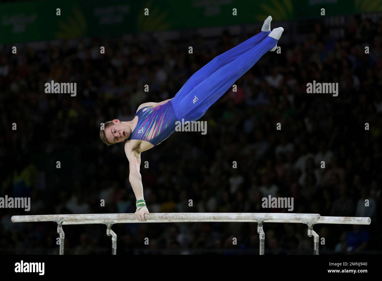 David Weir of Scotland competes on the parallel bars during the men's ...
