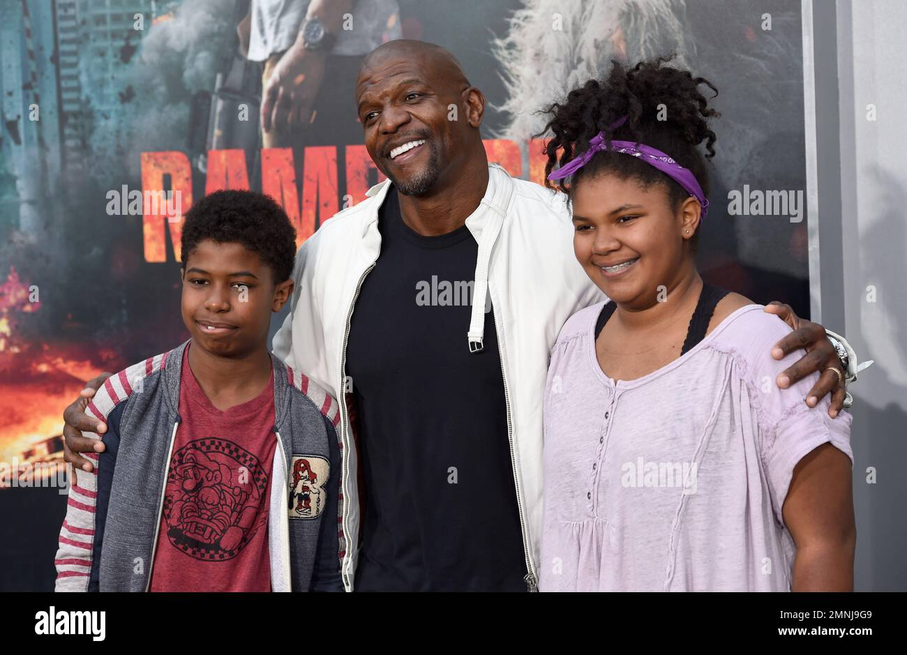 Terry Crews, center, and his children Isaiah Crews, left, and Wynfrey ...