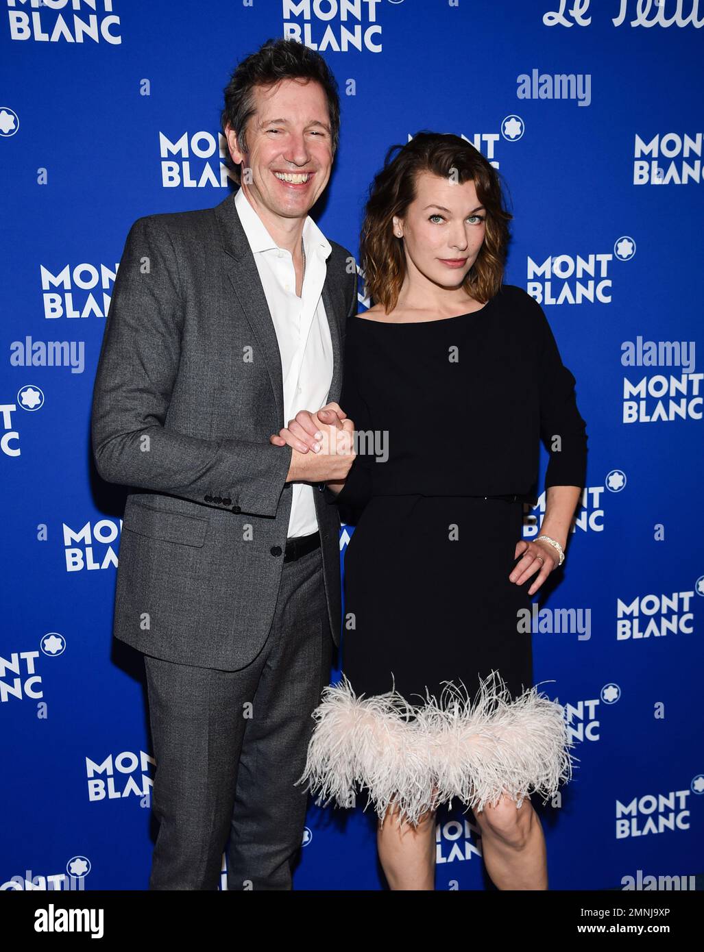 Writer/director Paul W.S. Anderson, left, and wife, actress Milla ...