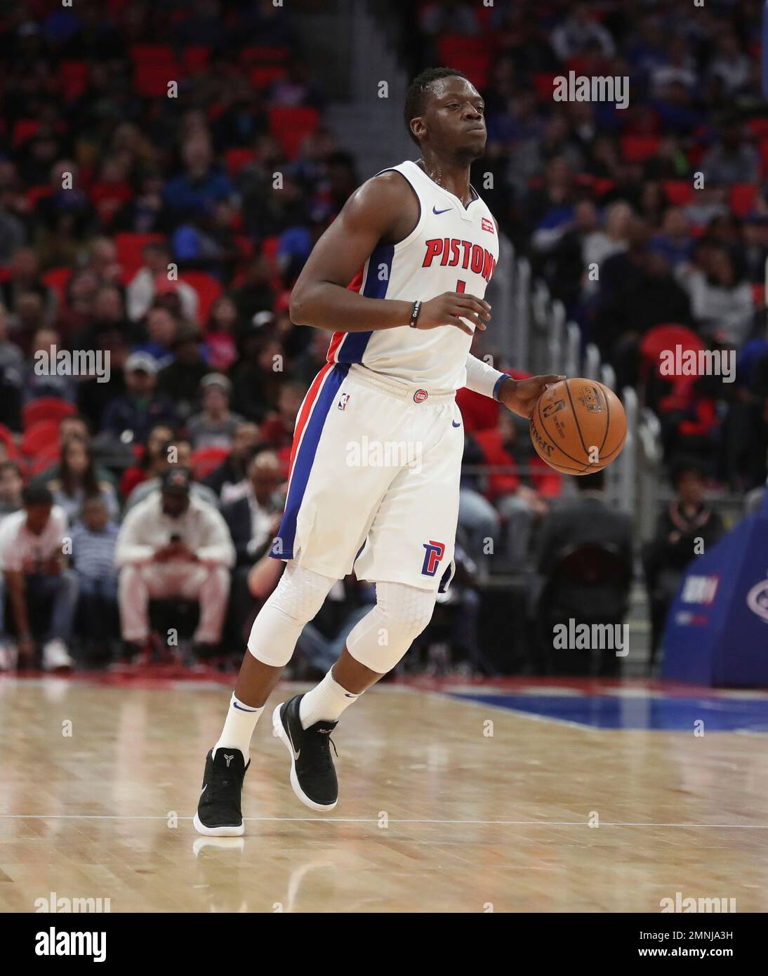 Detroit Pistons guard Reggie Jackson brings the ball up court during ...