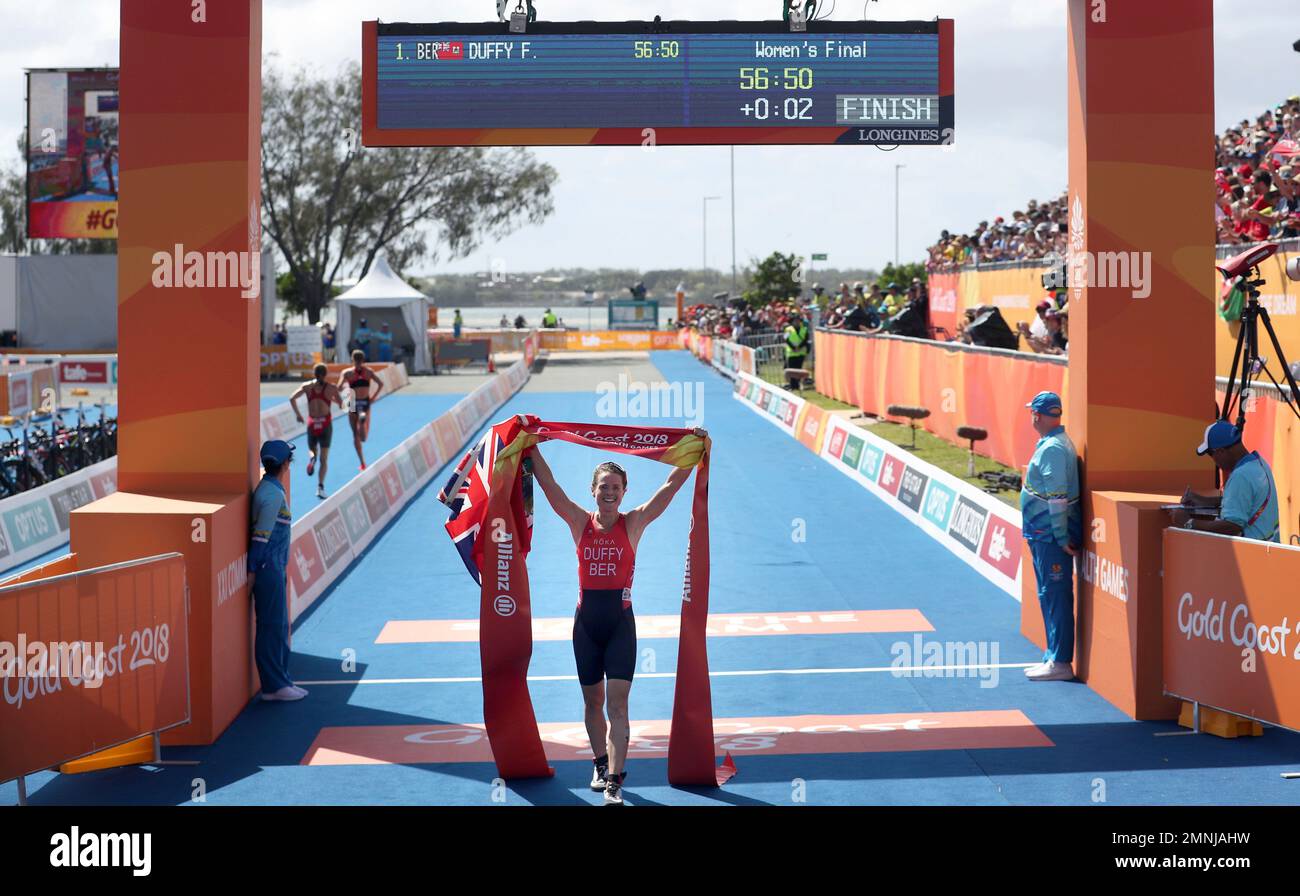 Flora Duffy of Bermuda celebrates as she wins the women's triathlon at ...
