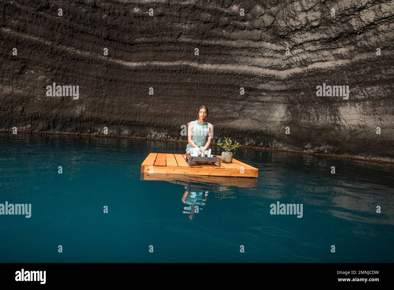 Woman kneeling outdoors hi-res stock photography and images - Alamy