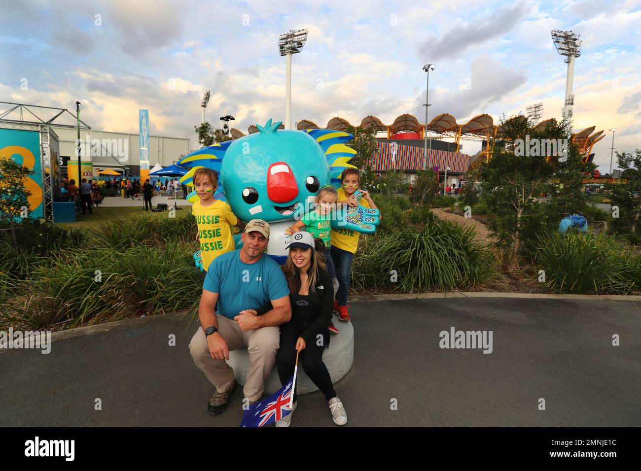 An Australian family poses with the Commonwealth Games mascot Borobi ...