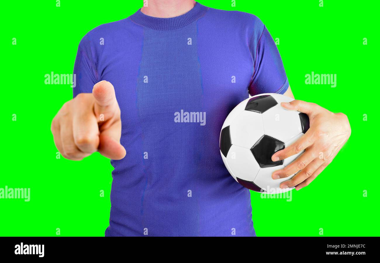 Soccer player with a ball and pointing with his finger.Isolated cutout ...