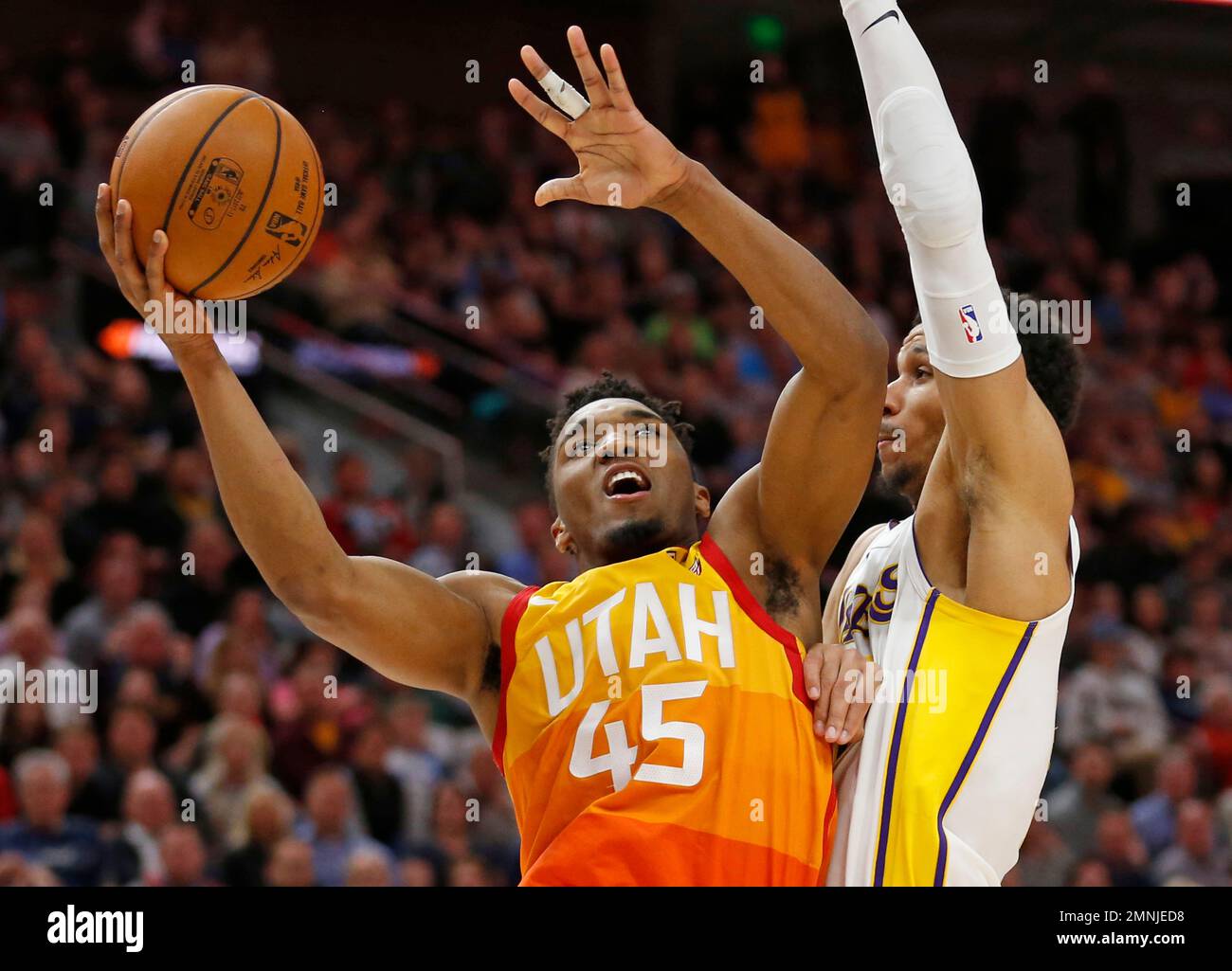 Utah Jazz guard Donovan Mitchell (45) goes to the basket as Los Angeles ...