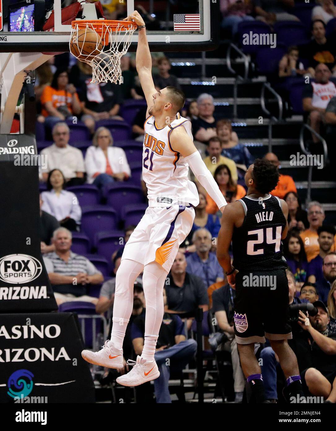 Phoenix Suns center Alex Len (21) dunks as Sacramento Kings guard Buddy ...