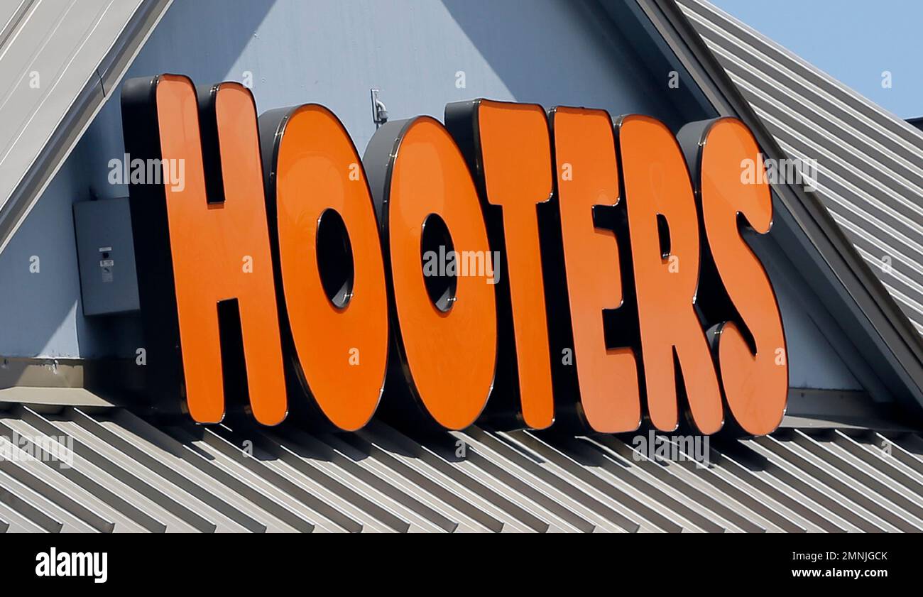 This photo taken Thursday, July 27, 2017, shows a Hooters sign at a ...