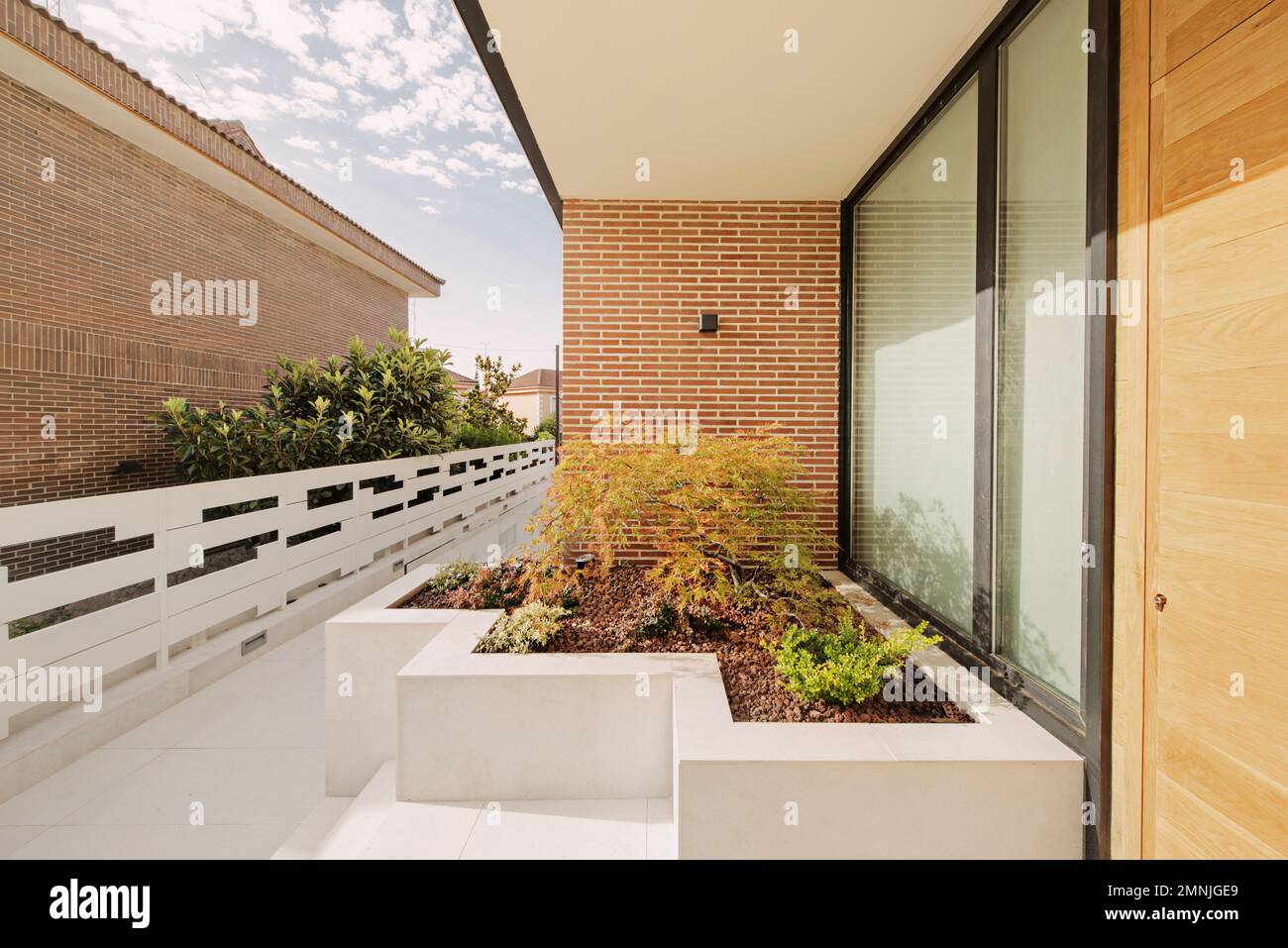 Entrance hall of a house with a corridor with a design window and a ...