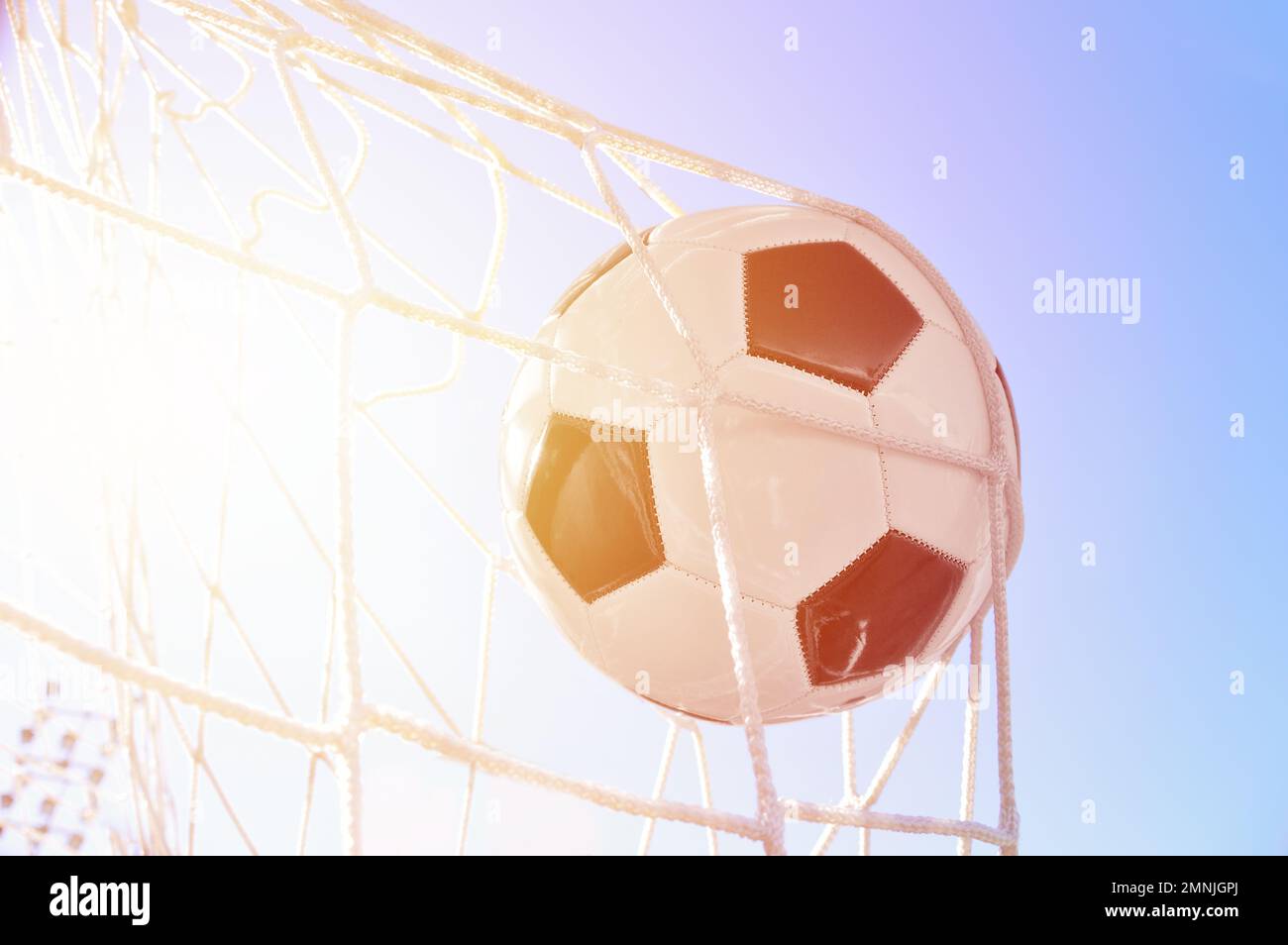 soccer ball with sunlight background Stock Photo - Alamy