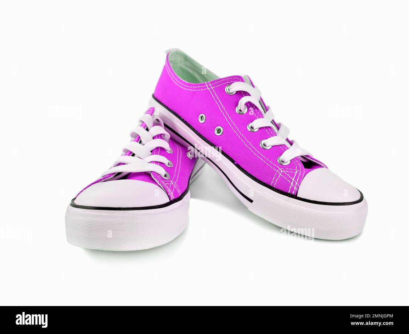 pair of pink sneakers shoes isolated on white background Stock Photo ...