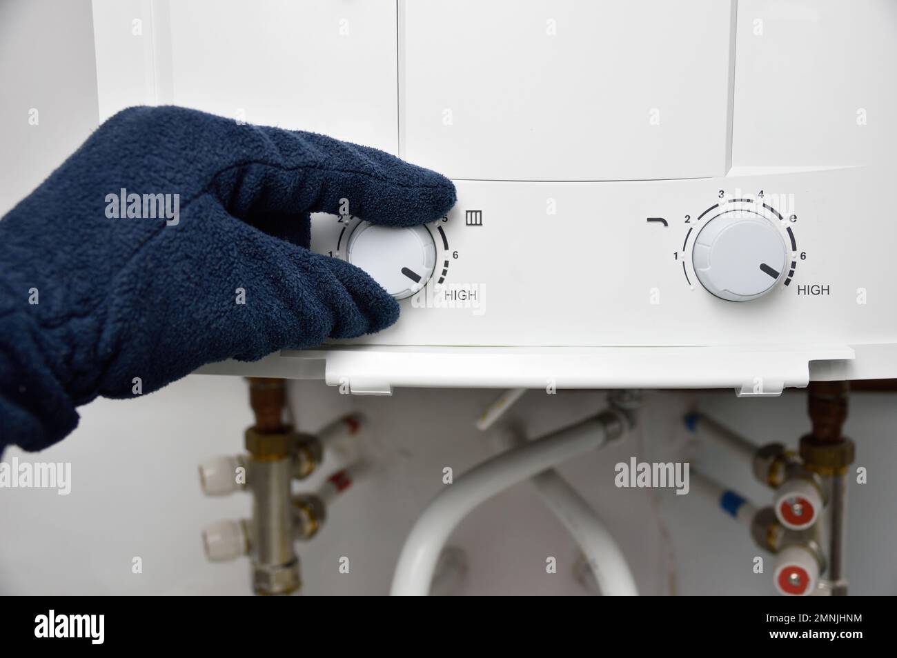 hand rotate temperature adjuster of water heater.High temp Stock Photo ...