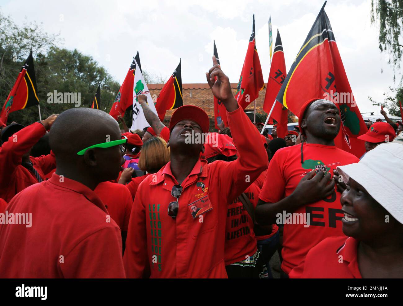 Members of the Economic Freedom Fighters (EFF) party gather outside the ...