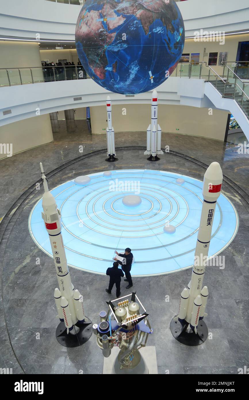 YANTAI, CHINA - JANUARY 30, 2023 - Visitors learn about a model of ...