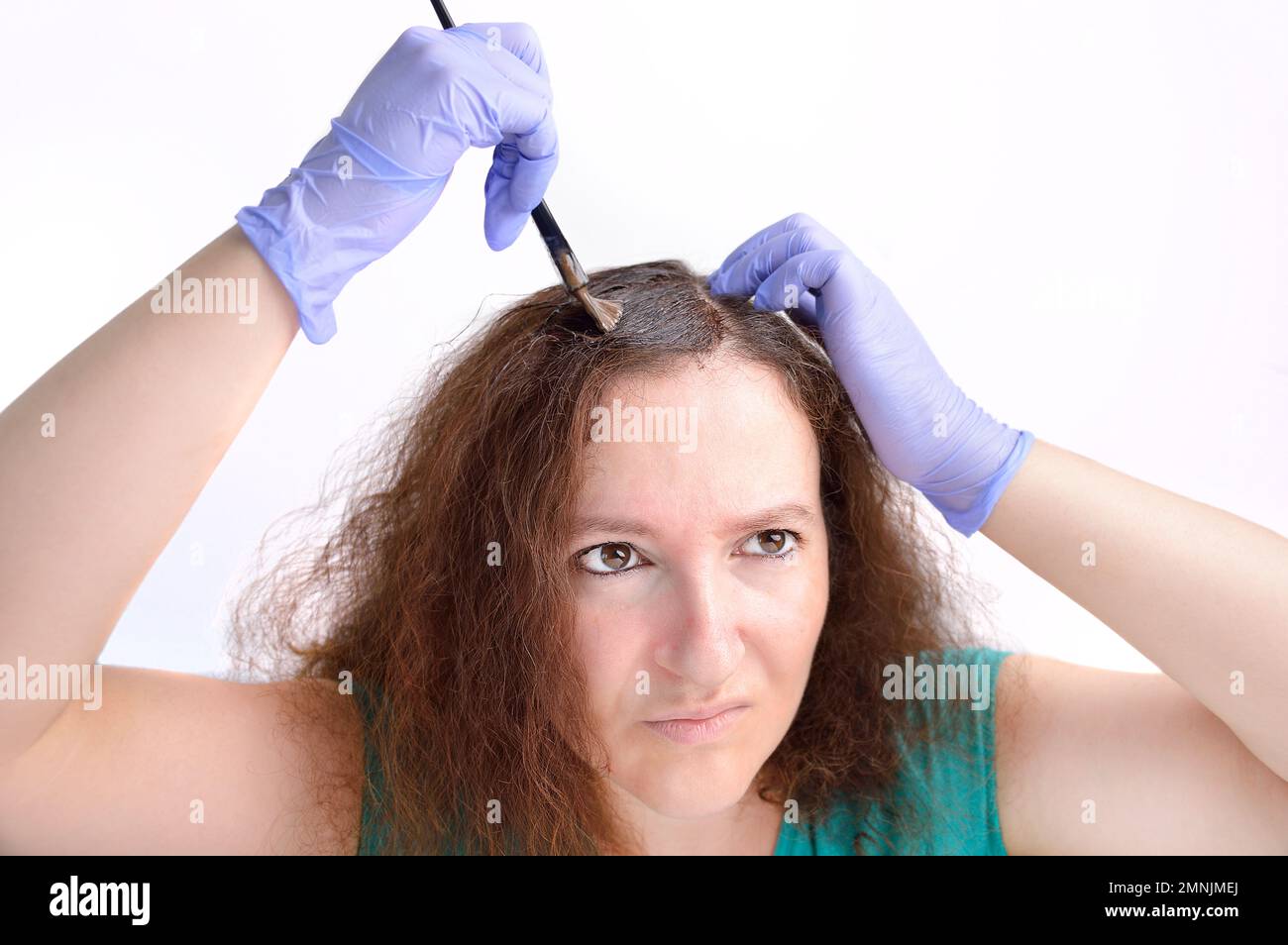 Woman in process of hair coloring and angry about her bad job Stock ...